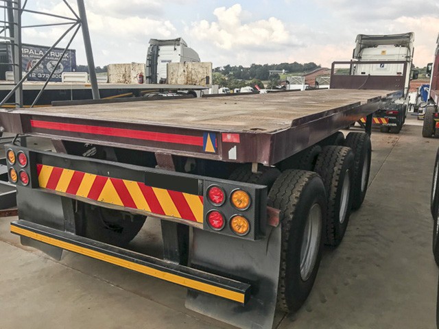 2002 BURG TRAILER FLAT DECK TRI-AXLE TRAILER | Impala Truck Sales