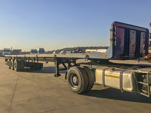 1990 Hendred Frauhauf Tri-axle Flat Deck 14M Trailer | Impala Truck Sales