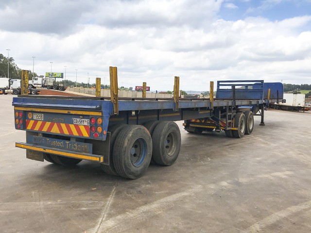 1996 Henred Fruehauf Flatdeck Superlink Trailer | Impala Truck Sales